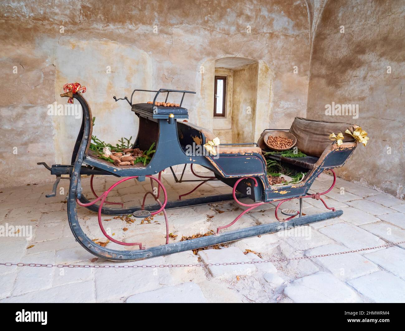 Historic sleigh for pulling by horses. Indoor patio, Kost Castle ...