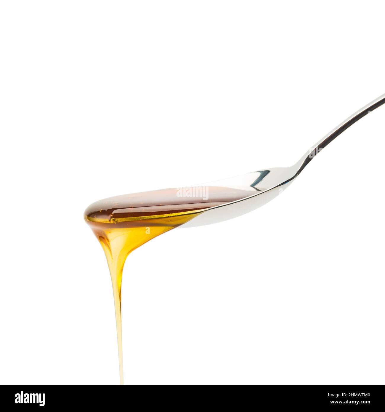 honey runs a spoon down Stock Photo - Alamy