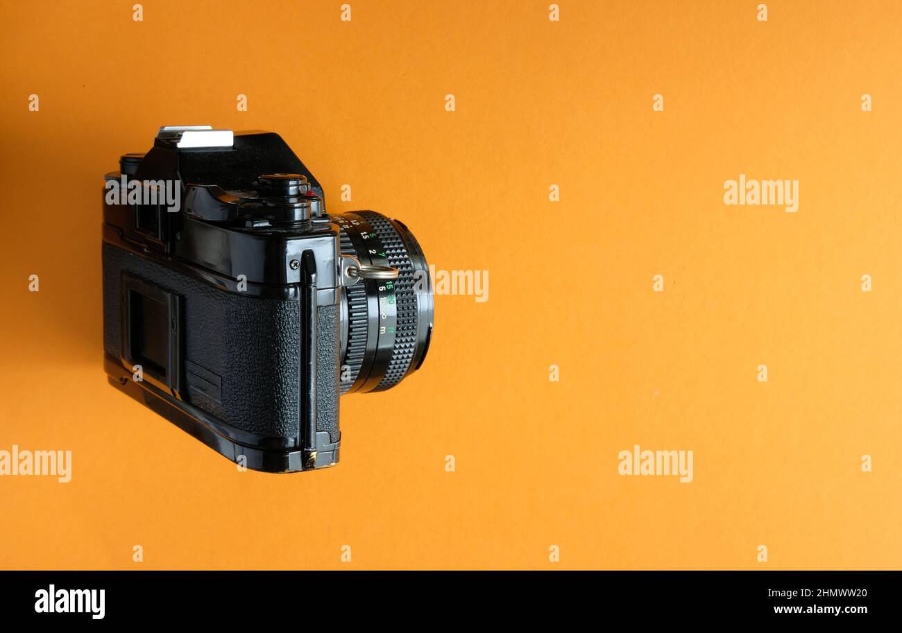 classic slr camera from the era of film photography - side view on ...
