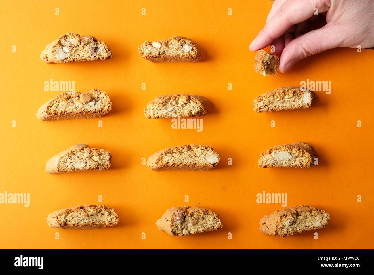 Italian 'biscotti' biscuits on orange background - top view Stock Photo ...
