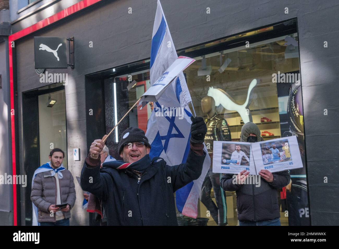 London, UK. 12th Feb 2022. Protesters at Puma's flagship Carnaby St ...