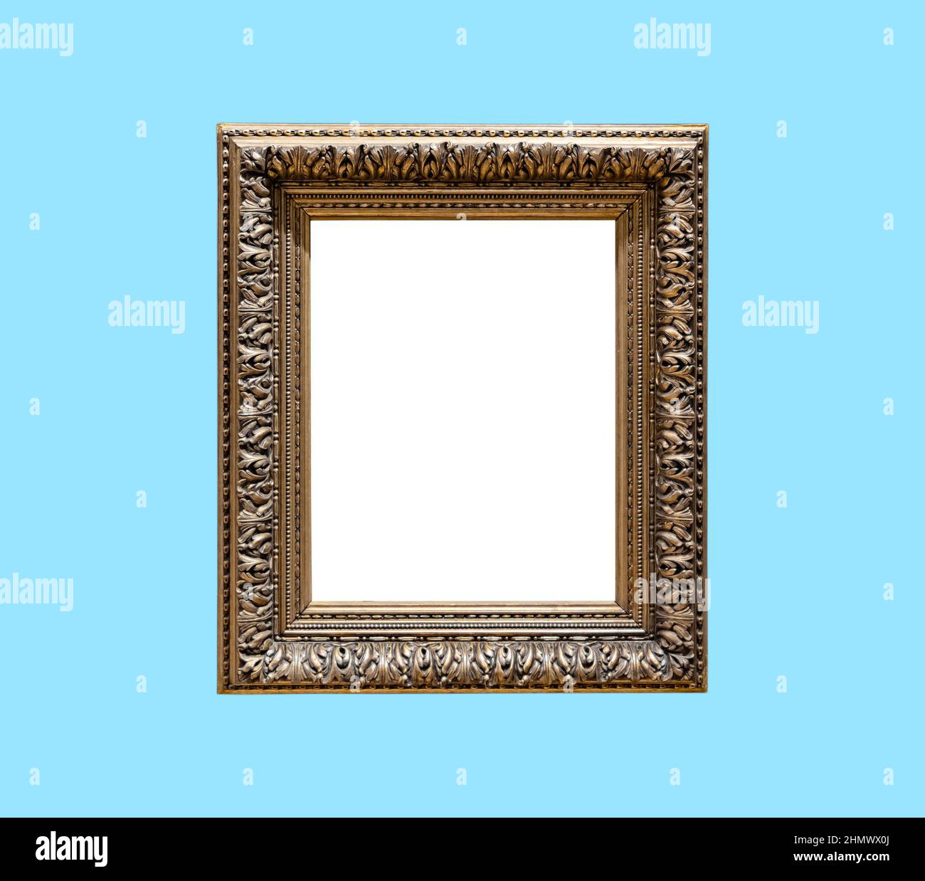 Big old antique golden frame isolated on blue background Stock Photo ...