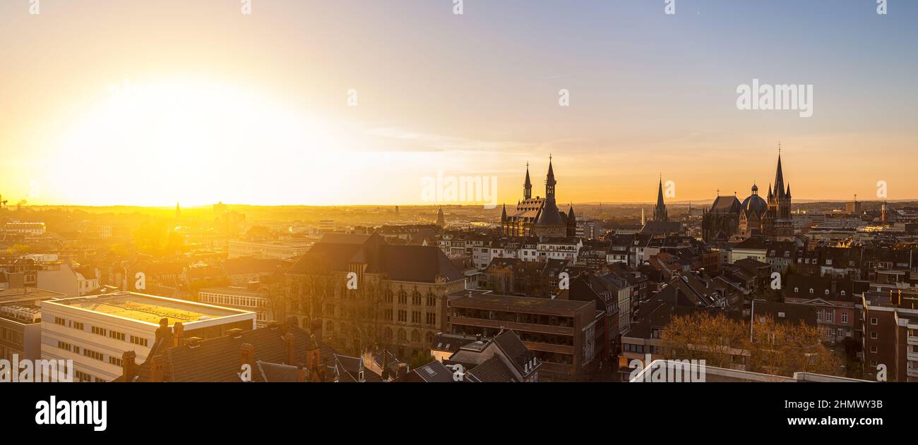 sunset over aachen city Stock Photo - Alamy