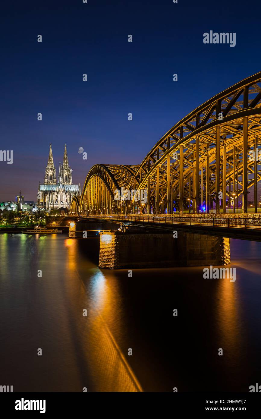 Cologne cathedral at night with moon Stock Photo - Alamy