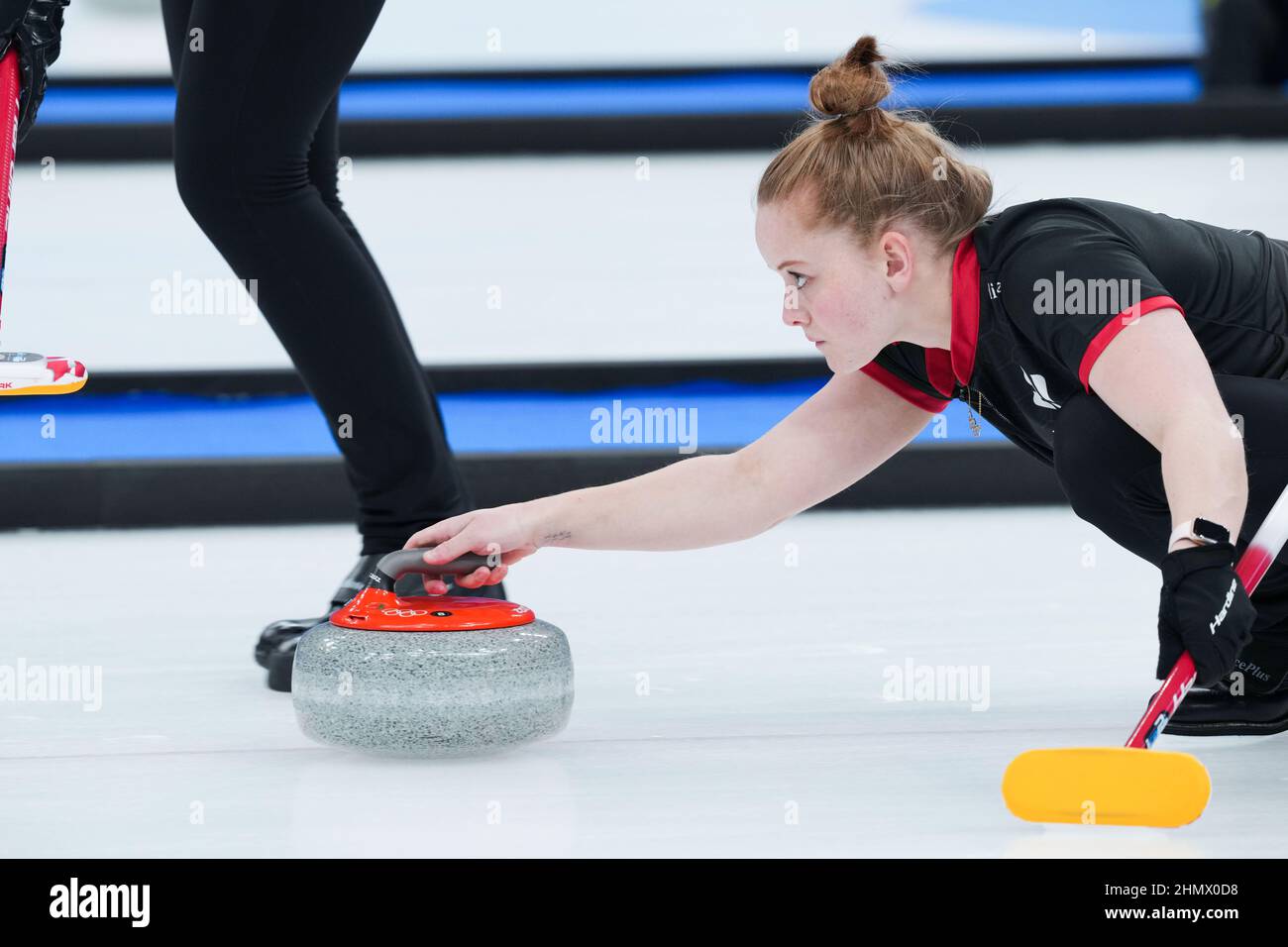 Beijing, China. 12th Feb, 2022. Mathilde Halse of Denmark curls the ...