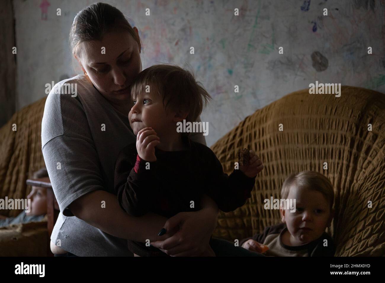 Gornyak, Ukraine. 09th Feb, 2022. Eugenia Mazur, 26, holds Andrey, age ...