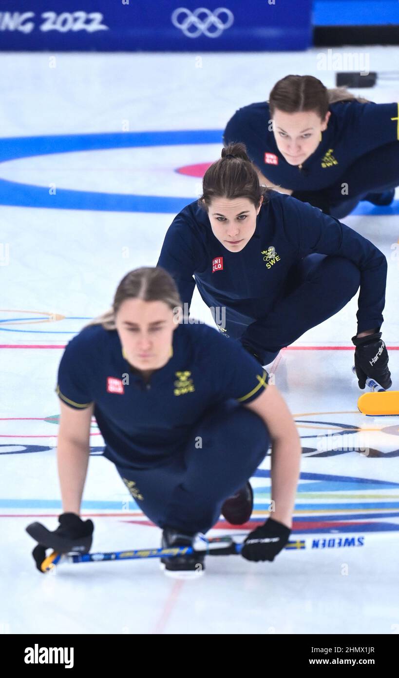 Beijing, China. 12th Feb, 2022. Anna Hasselborg (C) of Sweden competes ...