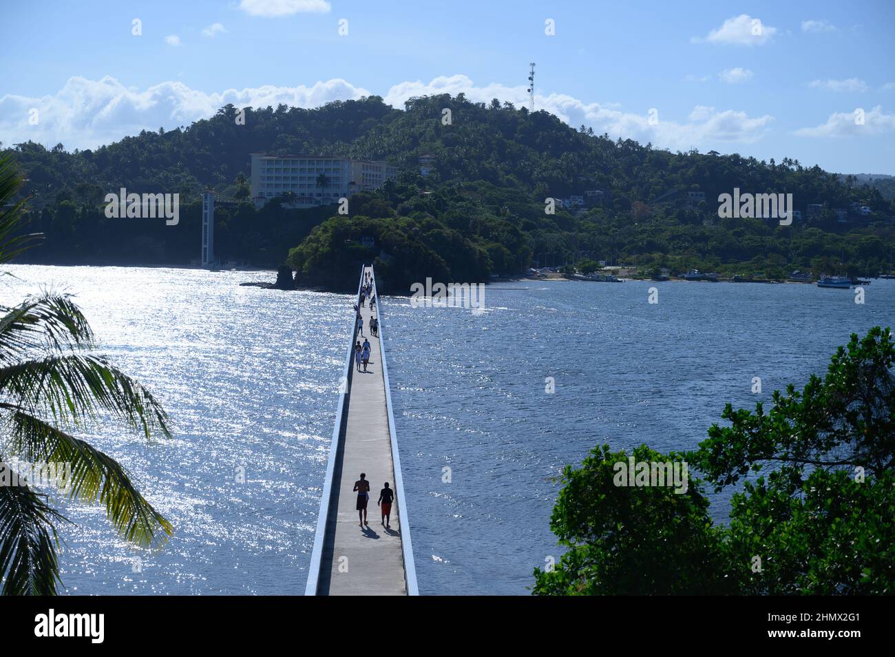 HD photo shows a bridge between islands in the Caribbean. Samana city ...