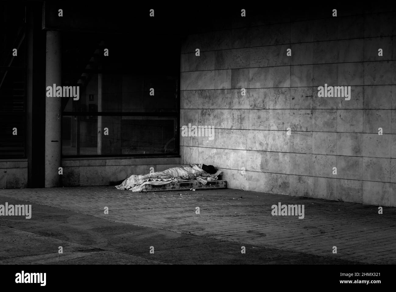 Person sleeping on the street, homeless vagrant, social poverty Stock ...