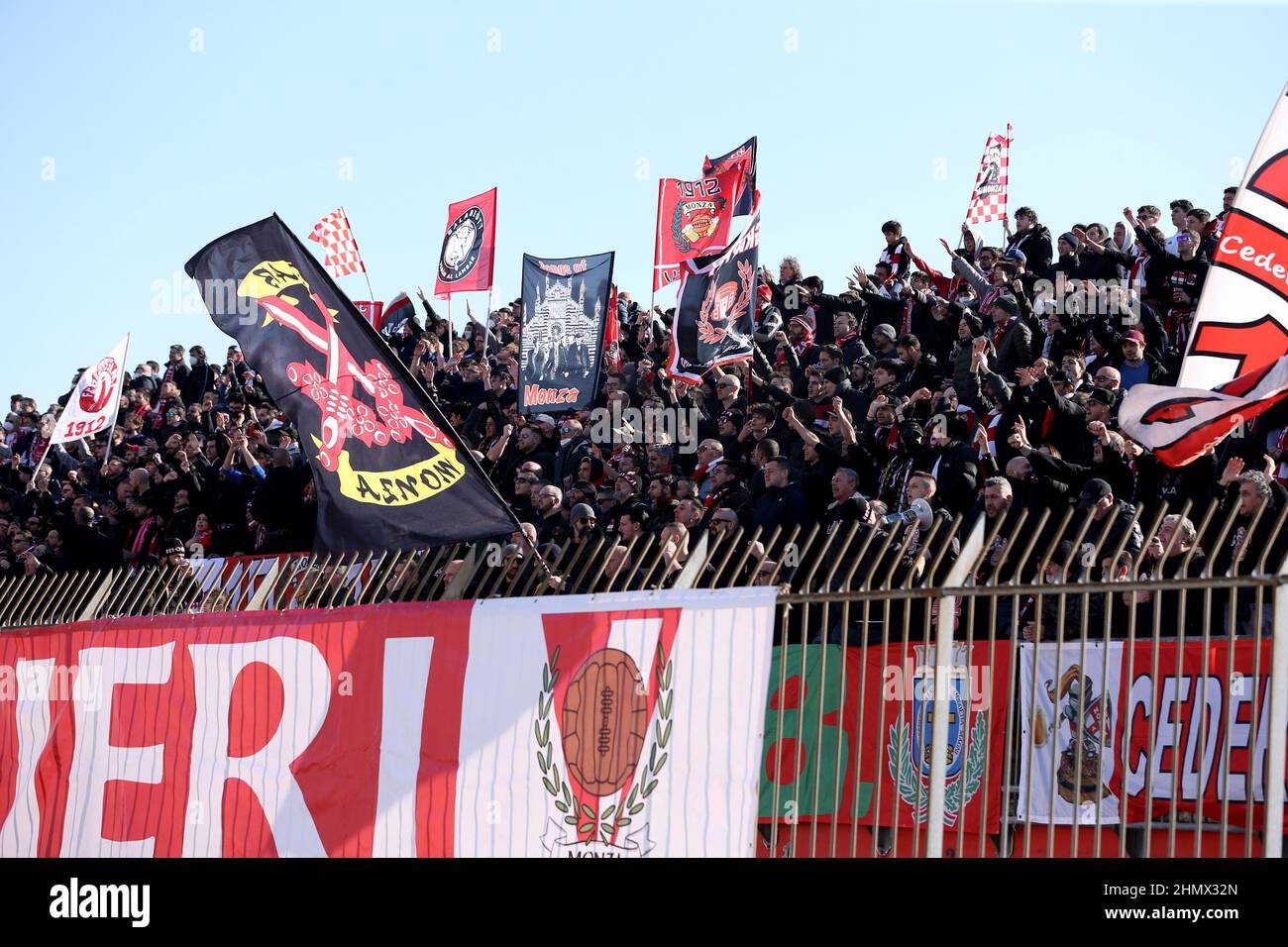 AC Monza supporters clap their hands and sing to support their team ...