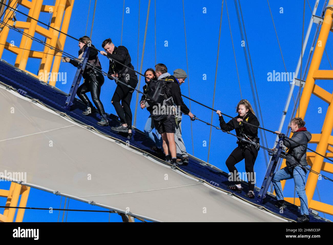 London, UK. 12th Feb, 2022. A group of people enjoy the "Up at the O2 ...