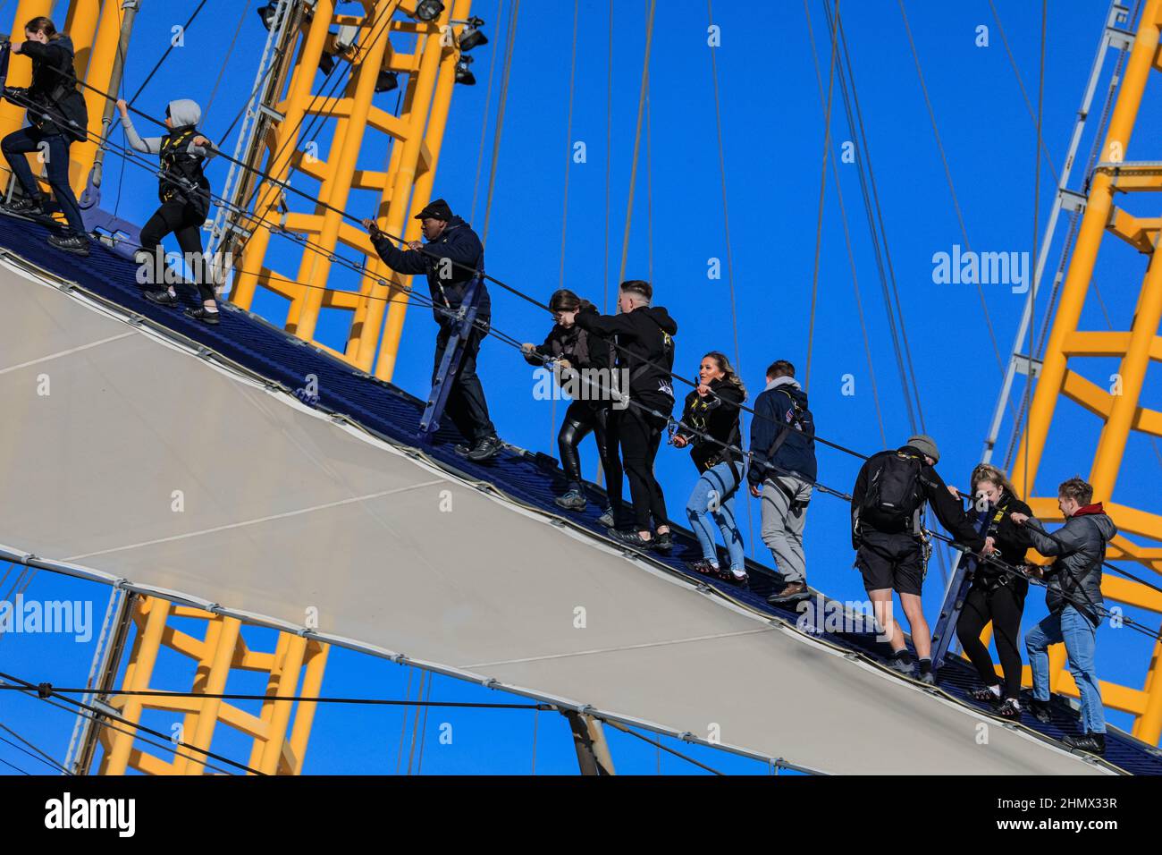 London, UK. 12th Feb, 2022. A group of people enjoy the "Up at the O2 ...