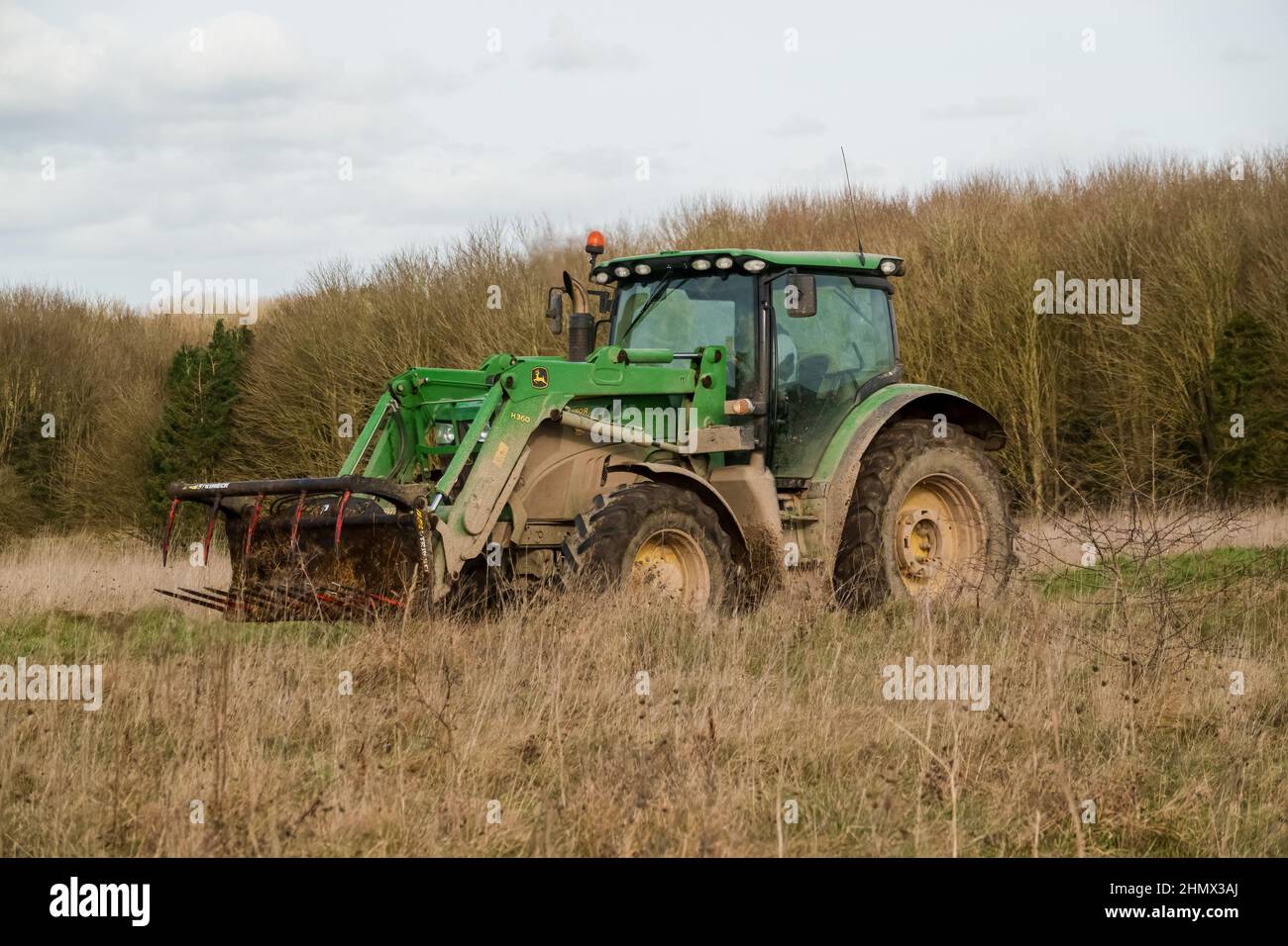 John Deere 6150R farm tractor with H360 front end loader Stock Photo ...
