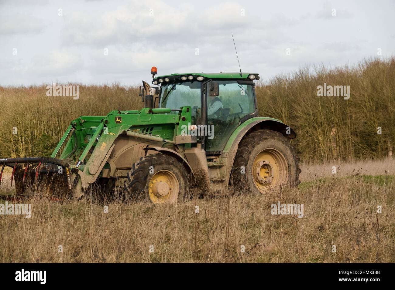 John Deere 6150R farm tractor with H360 front end loader Stock Photo ...