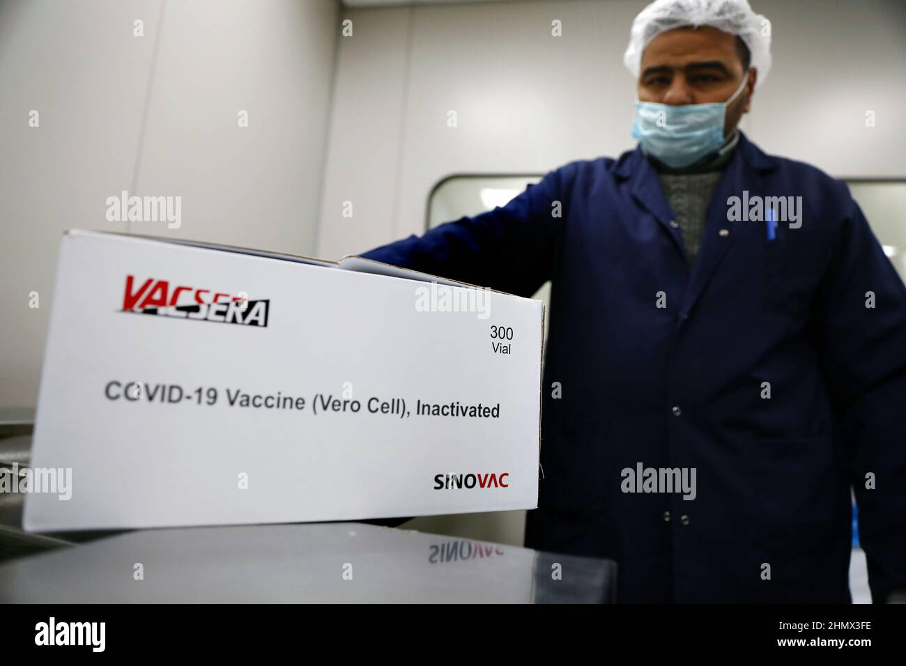 Cairo, Egypt. 3rd Feb, 2022. A staff member shows packed COVID-19 ...