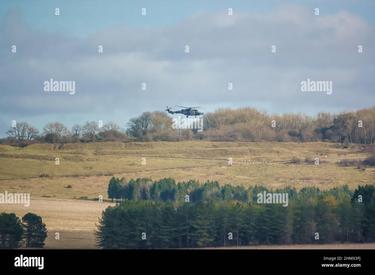 British army AgustaWestland AW159 Wildcat AH1 helicopter flying low ...