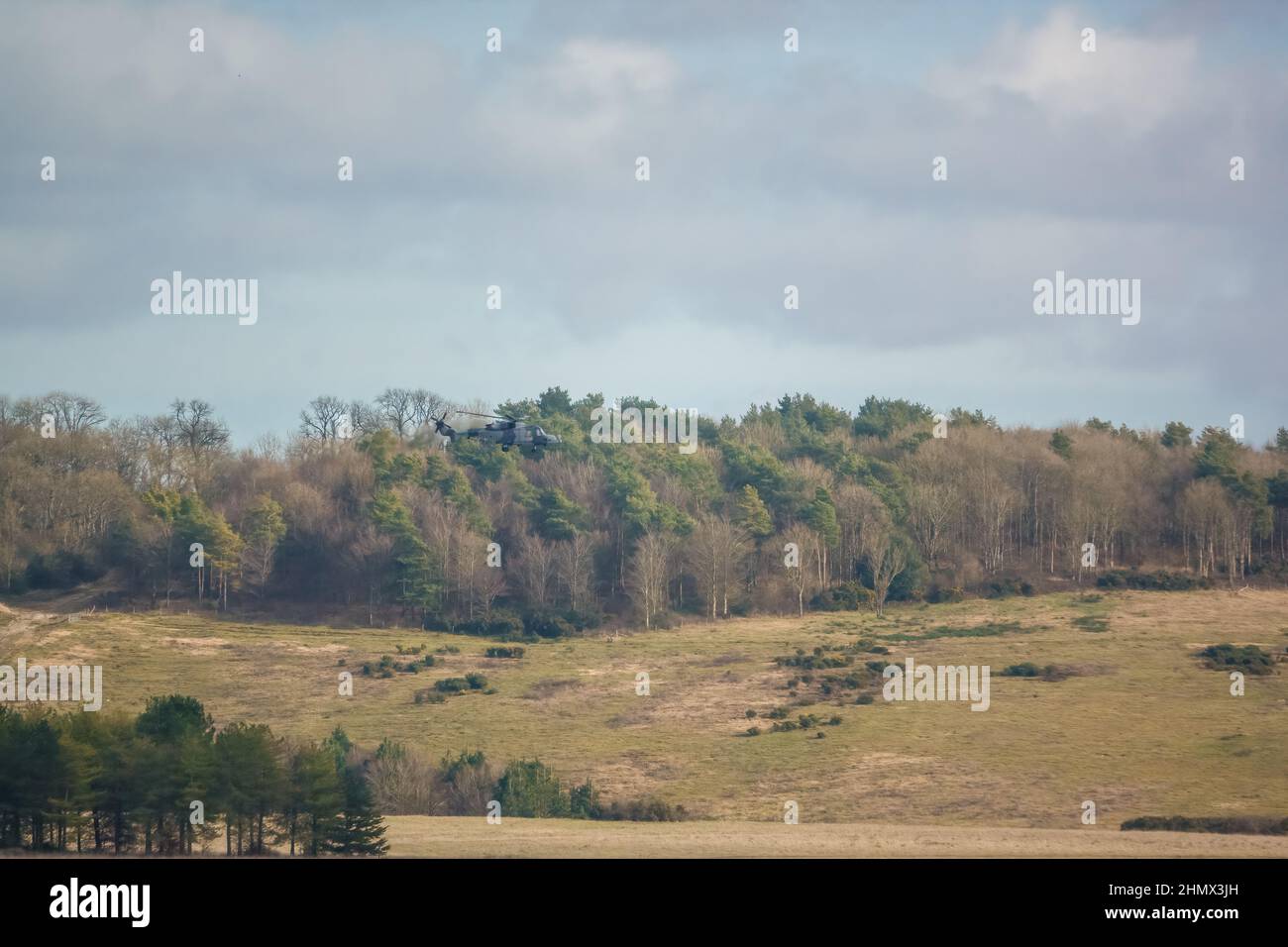 British army AgustaWestland AW159 Wildcat AH1 helicopter flying low ...