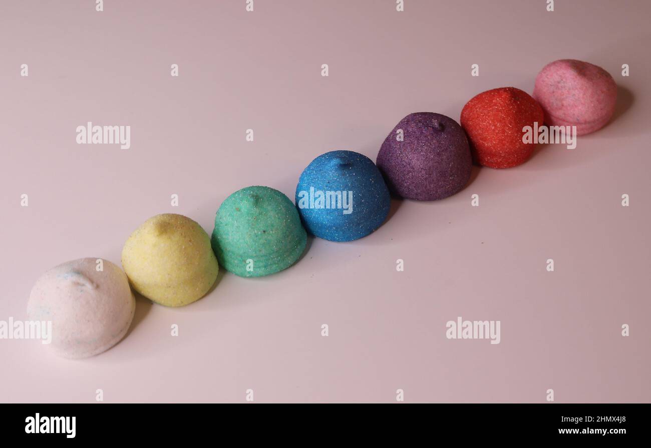 Selective focus on very colorful marshmellow candy on a white ...