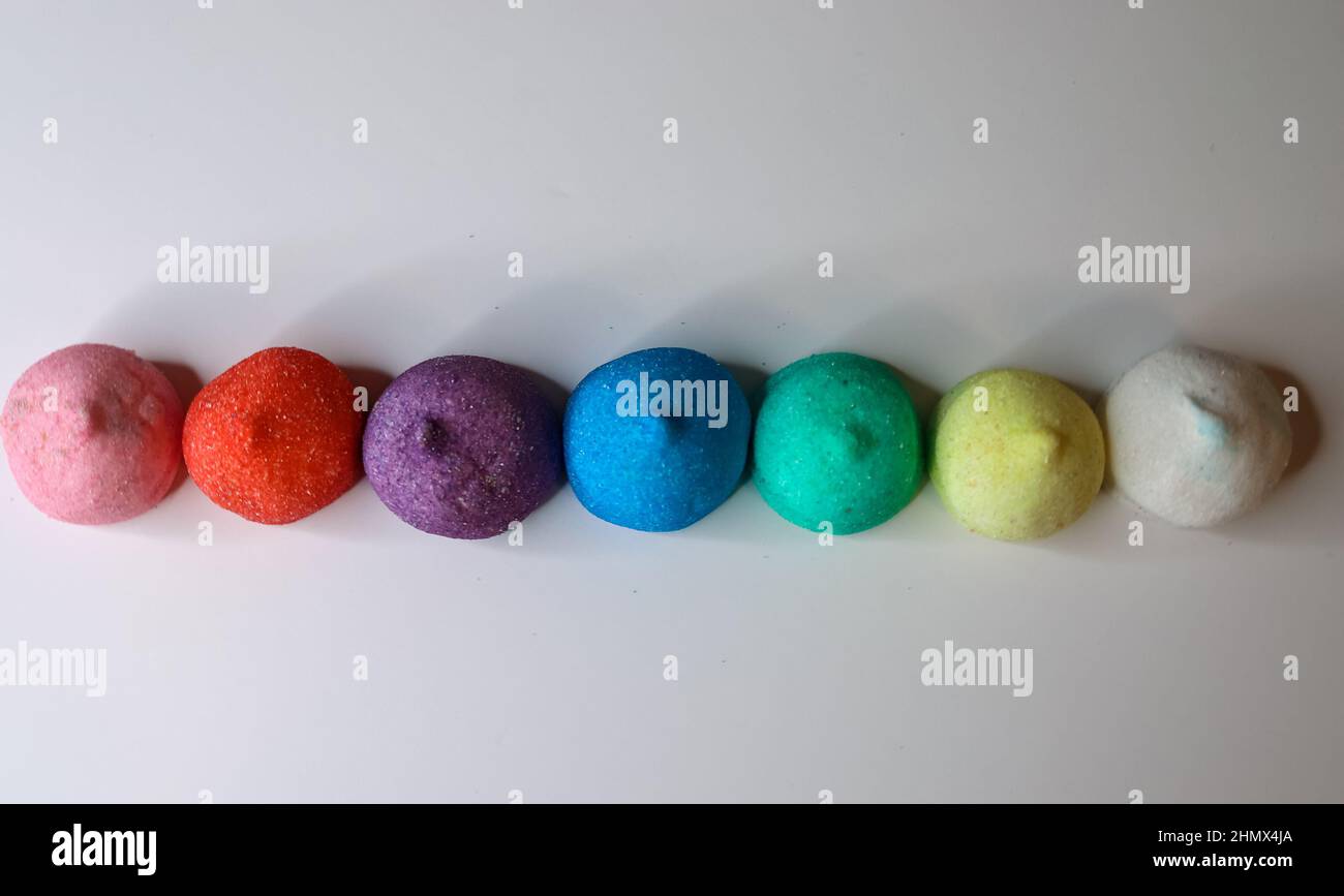 Selective focus on very colorful marshmellow candy on a white ...