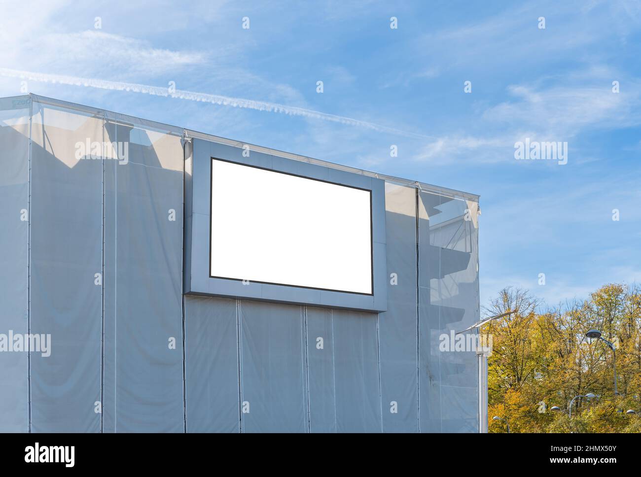 Blank empty billboard on construction building with blue sky Stock ...