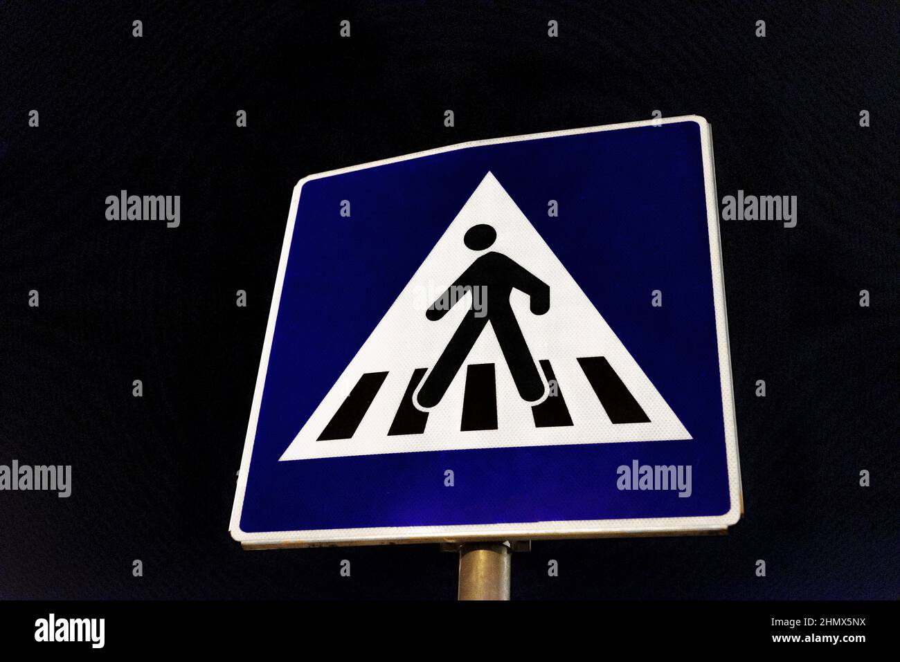 Blue road sign pedestrian crossing on the night Stock Photo - Alamy