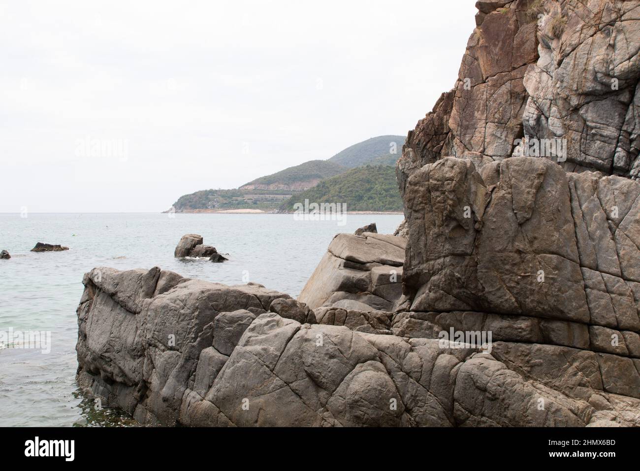 The stone coast of Vietnam. Large boulders on the beach Stock Photo - Alamy