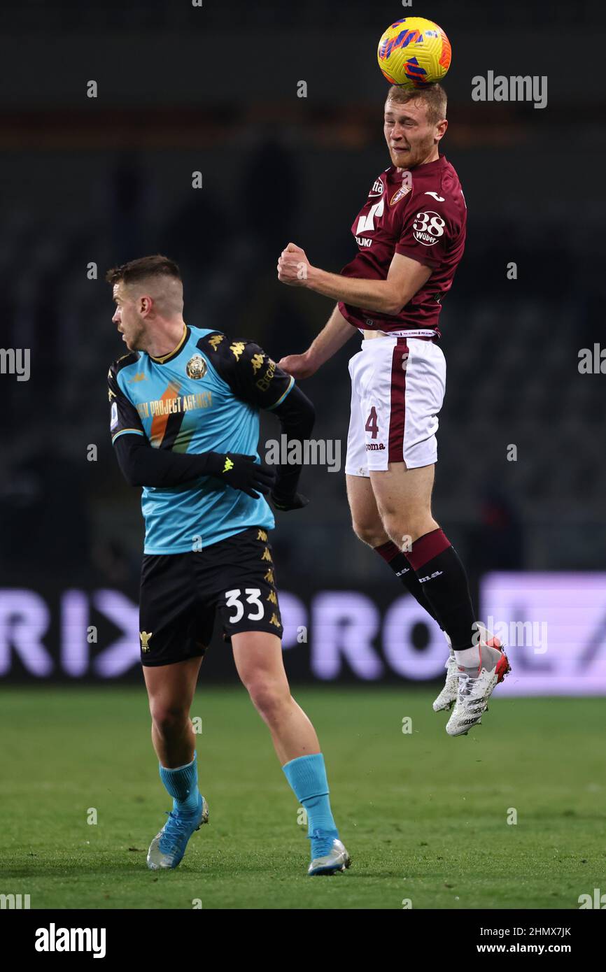 Turin, Italy, 12th February 2022. Tommaso Pobega of Torino FC heads ...