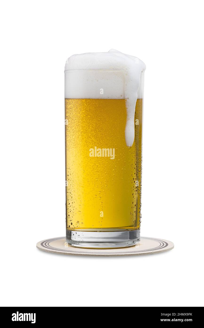 overflowing beer glass on a beermat Stock Photo - Alamy