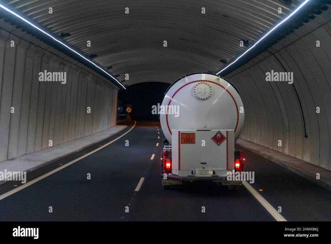 Tanker truck with dangerous goods, flammable gases, circulating inside ...