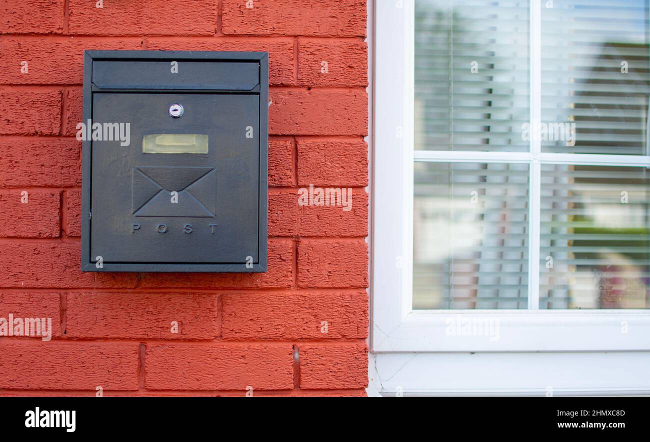 Mailboxes mounted at entry gates, mailboxes embedded in a stone wall ...