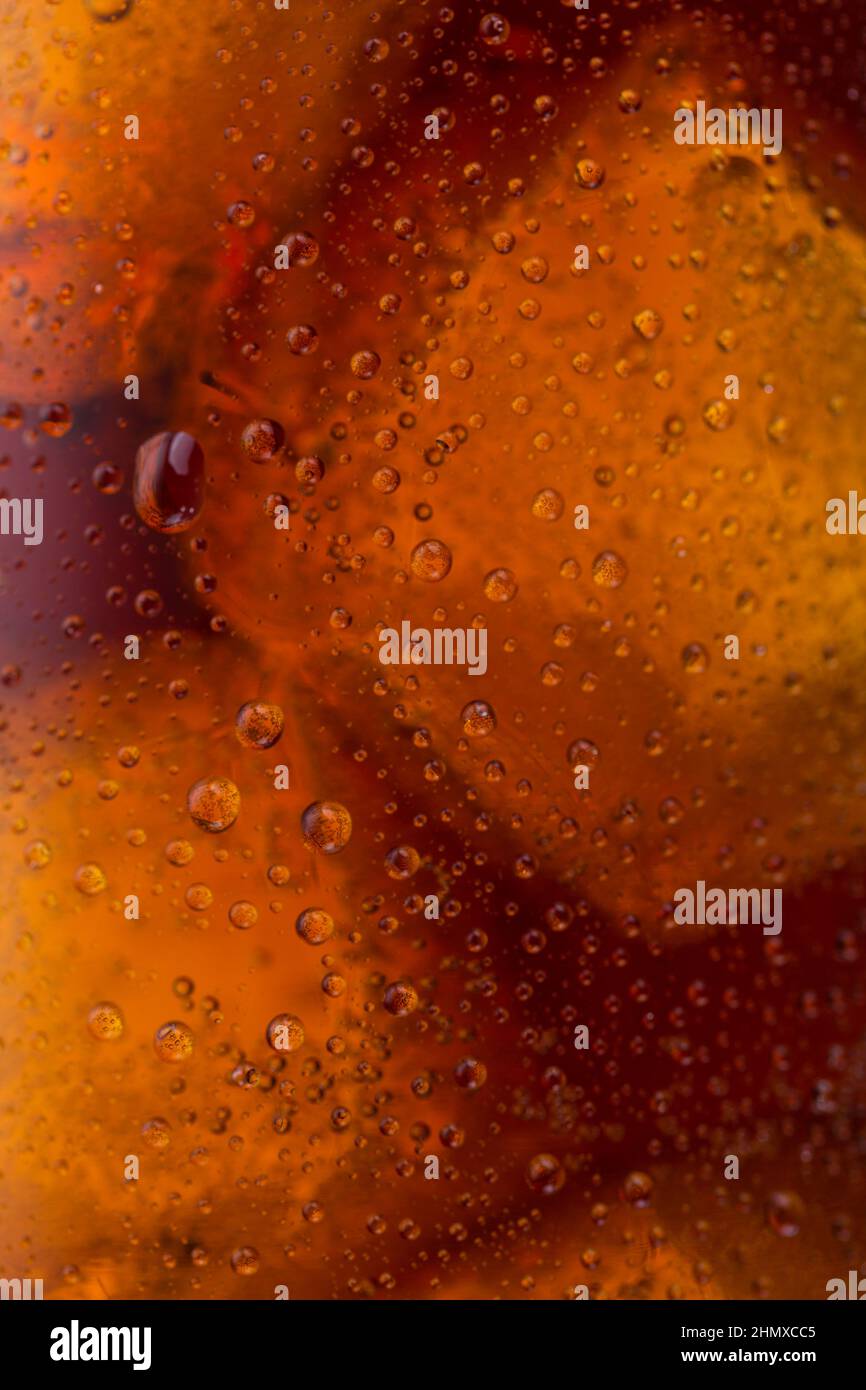 cold cola with dew drops and ice Stock Photo - Alamy