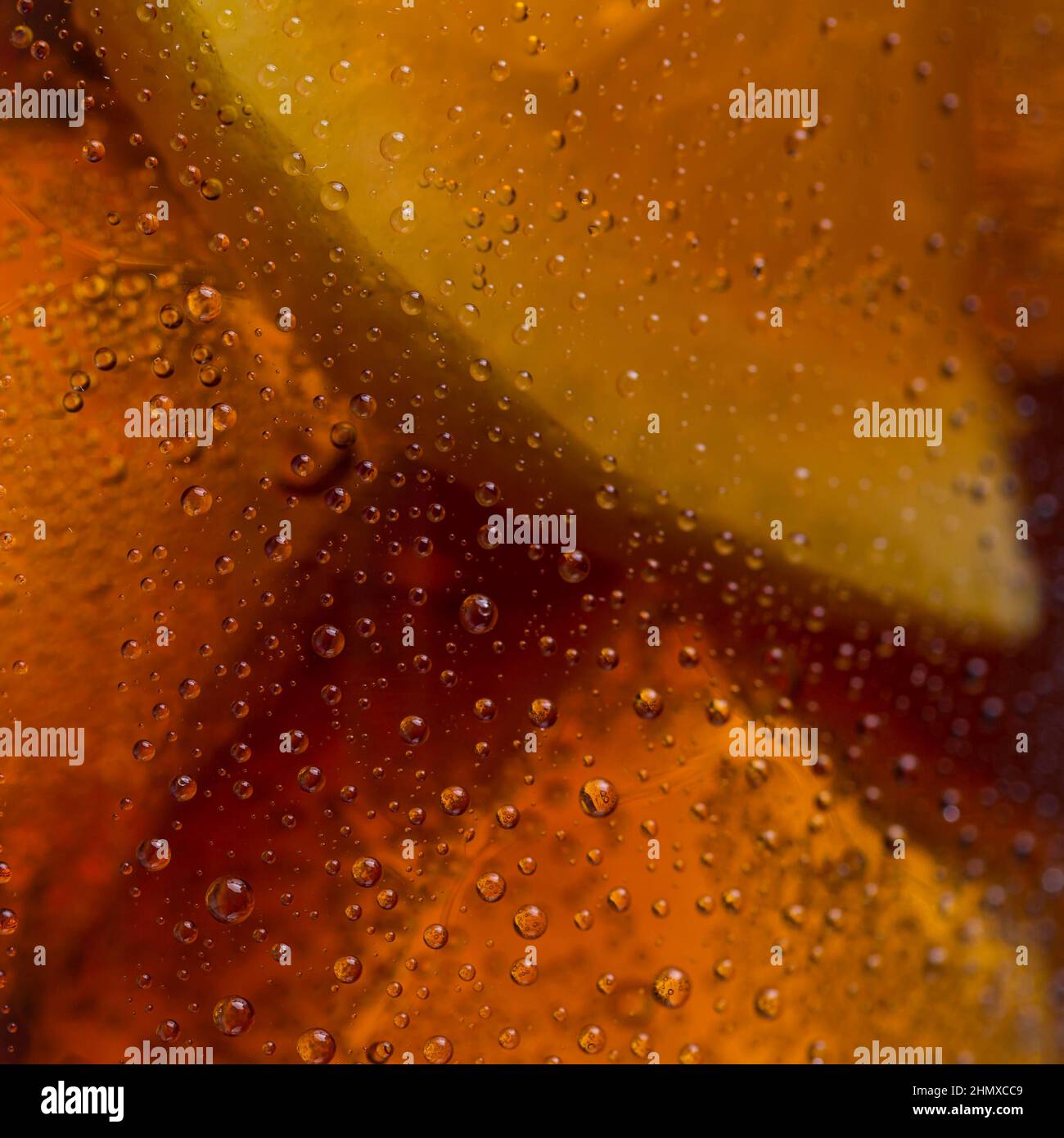 cold cola with ice cubes and lemon background Stock Photo - Alamy