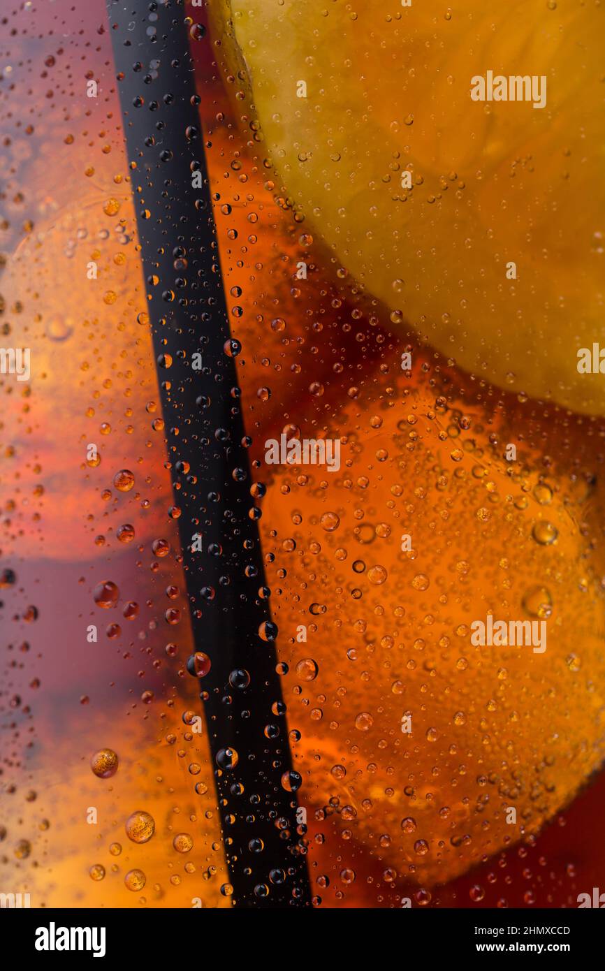 cold cola with straw and lemon Stock Photo - Alamy