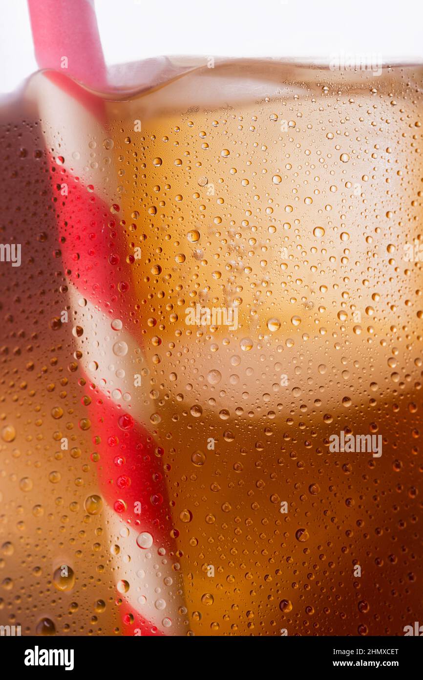 closeup from a cola glass with ice and dew Stock Photo - Alamy