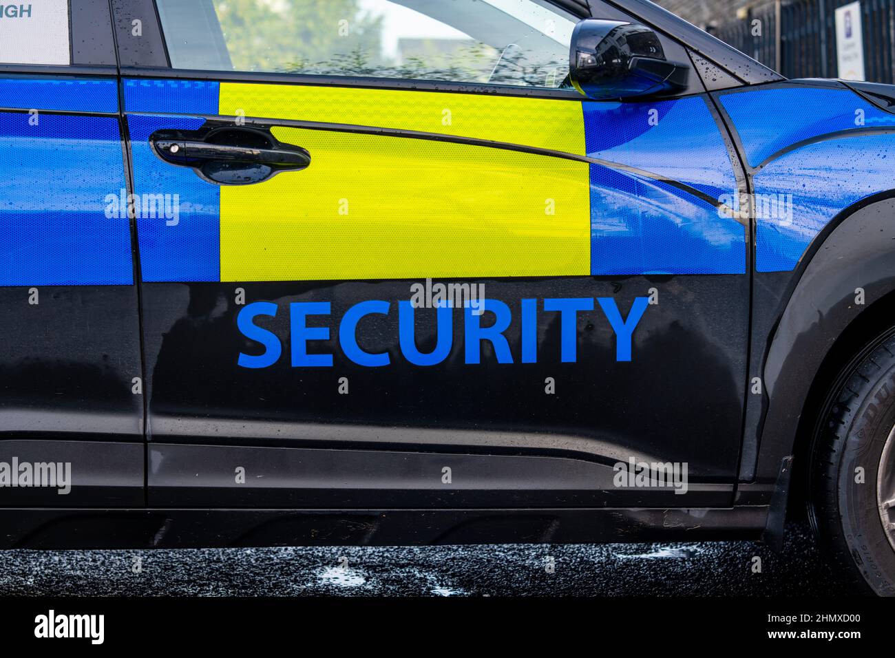 car for security, black and blue and yellow car for control Stock Photo ...