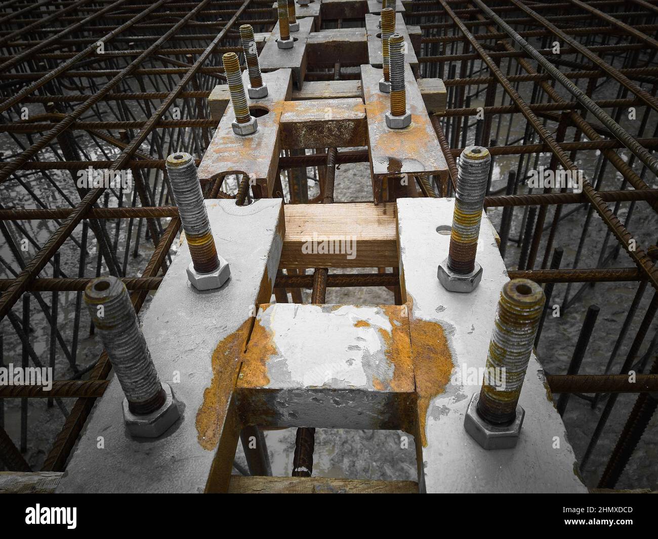 Rows of anchor bolts Stock Photo - Alamy
