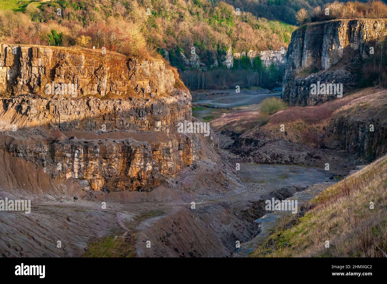 The dramatic restored remains of Goddard's limestone quarry, in bright ...