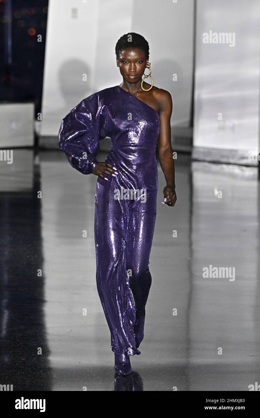 Model Wayne Booth walks on the runway at the Christian Cowan fashion ...