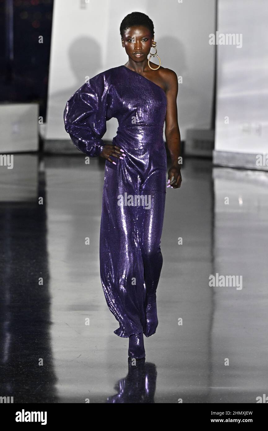 Model Wayne Booth walks on the runway at the Christian Cowan fashion ...