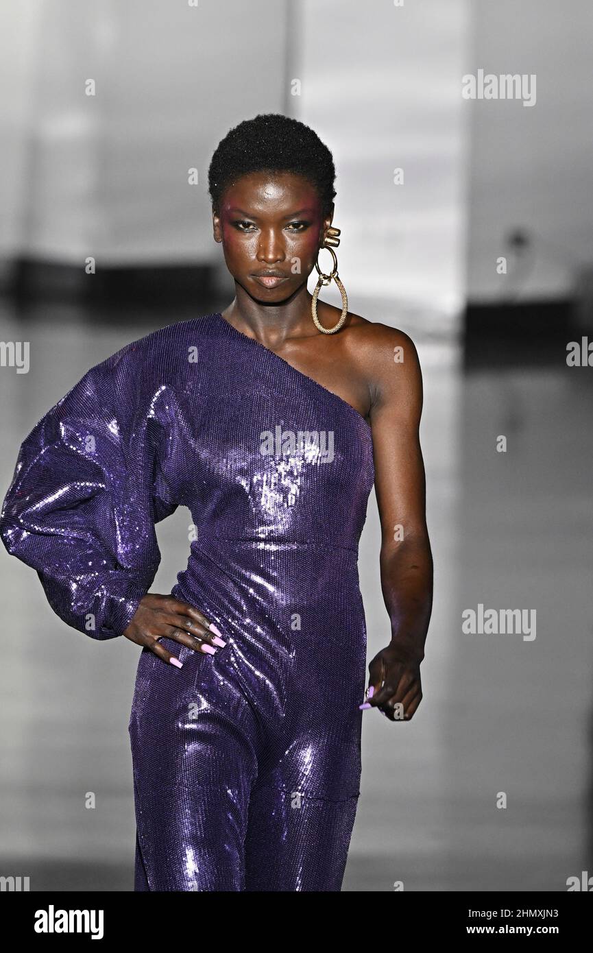 Model Wayne Booth walks on the runway at the Christian Cowan fashion ...