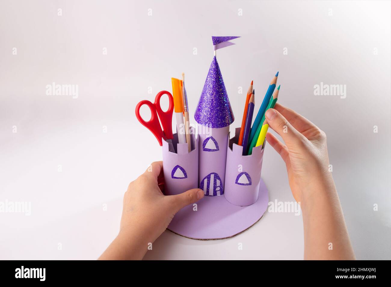 DIY cardboard castle craft in the form of a stand for school items made ...