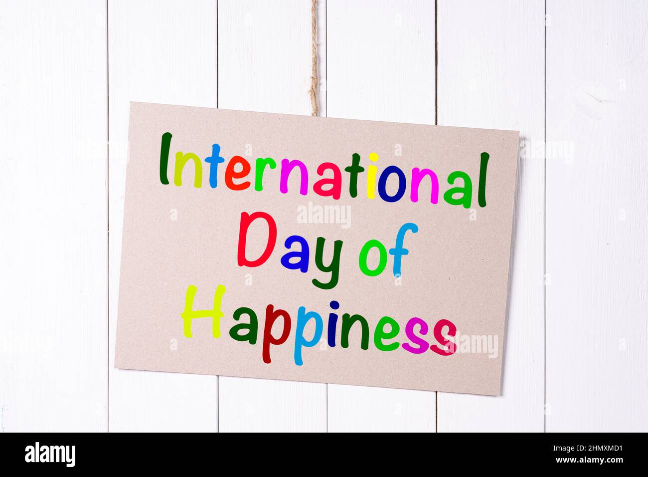 A sign celebrating the United Nations International Day of Happiness at ...