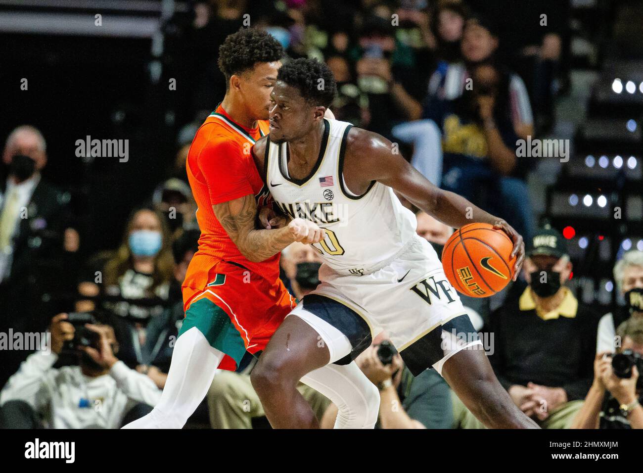 Winston-Salem, NC, USA. 12th Feb, 2022. Miami (Fl) Hurricanes guard Jordan Miller (11) gets ...