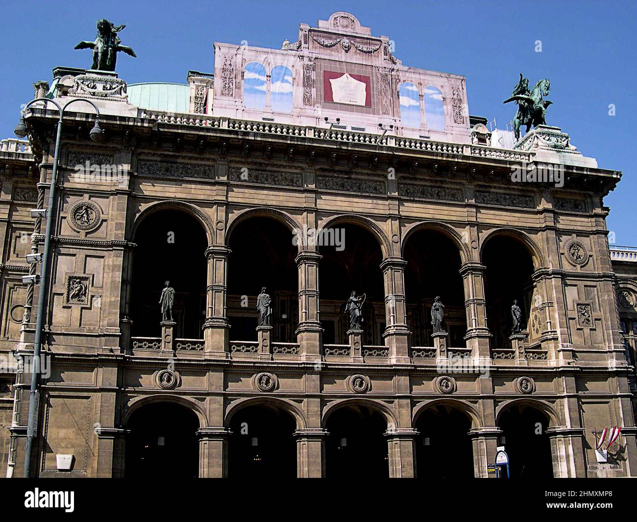The beautiful entrance to the Vienna State Opera House where classical ...