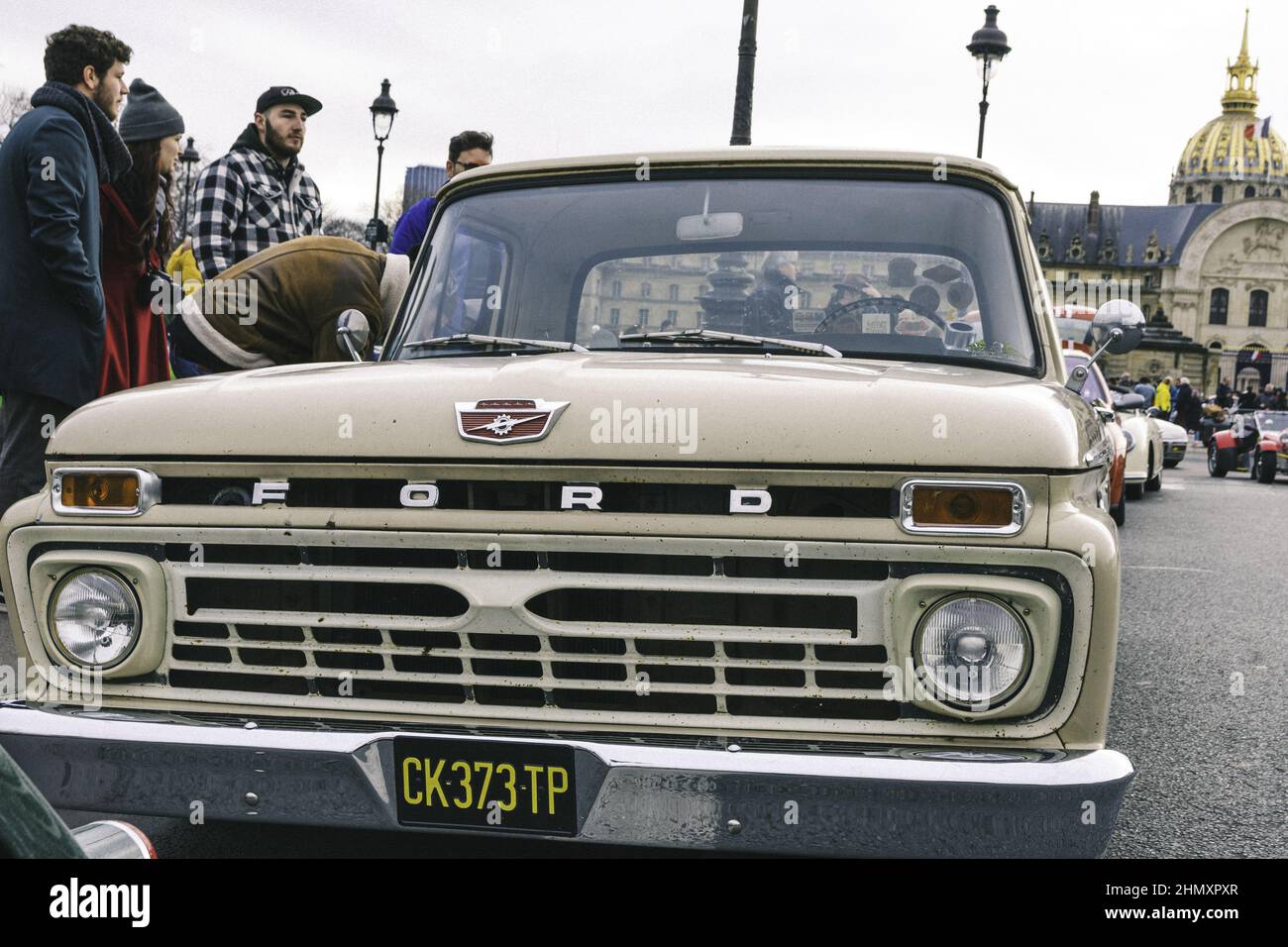 Photo of Ford F-100 van cream color, pick up truck parked in the street ...