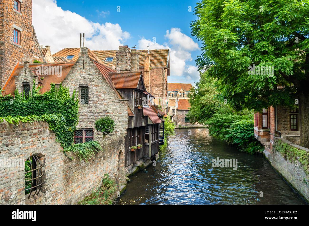 Urban landscape, buildings along the canal in Bruges, Flanders, Belgium ...