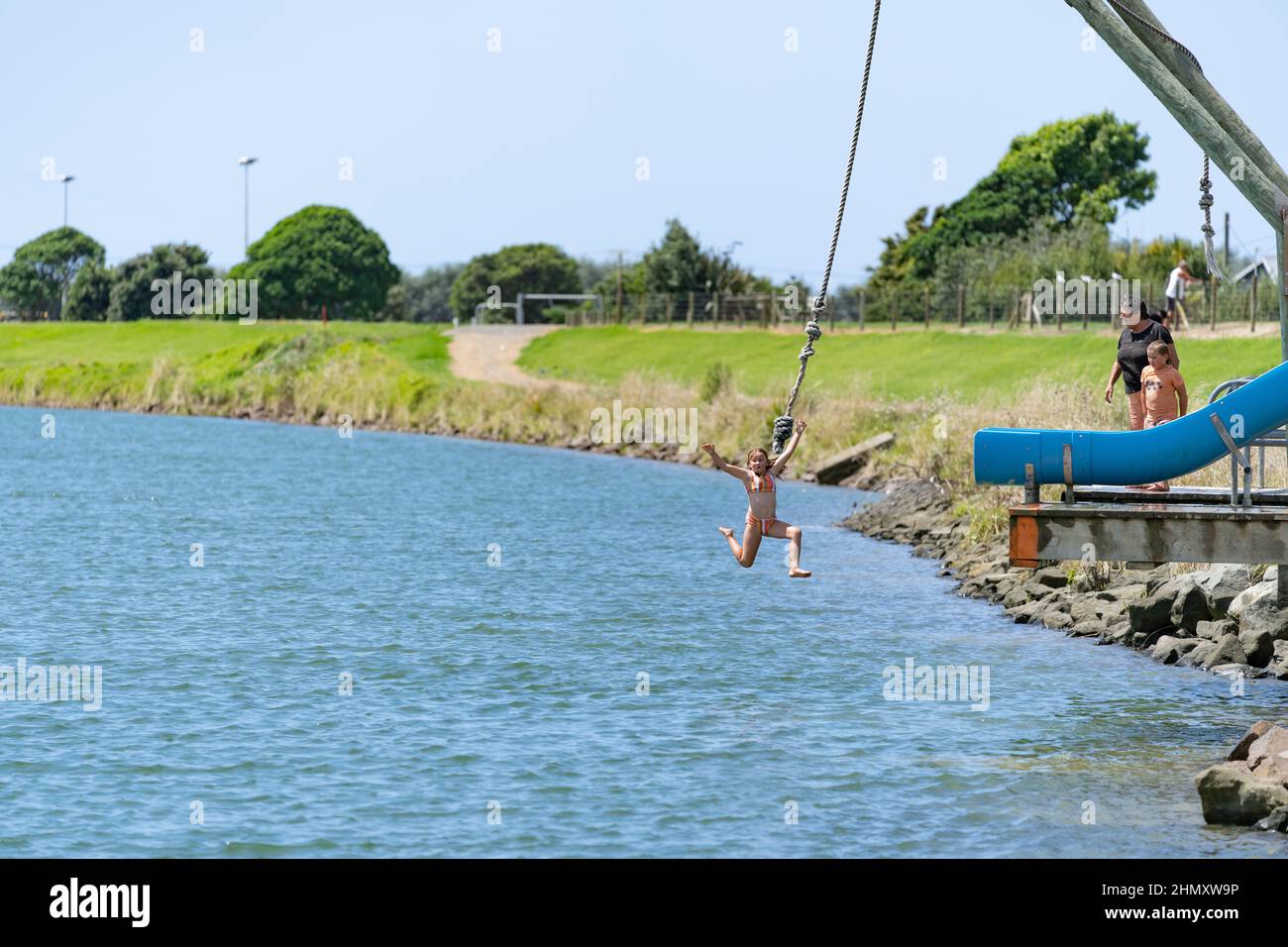 Opotiki New Zealand - January 30 2022; Young people jumping into Otara ...