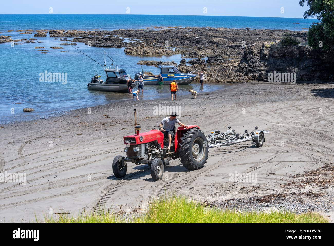 Te Kaha New Zealand - January 31 2022; boats return to shore and being ...