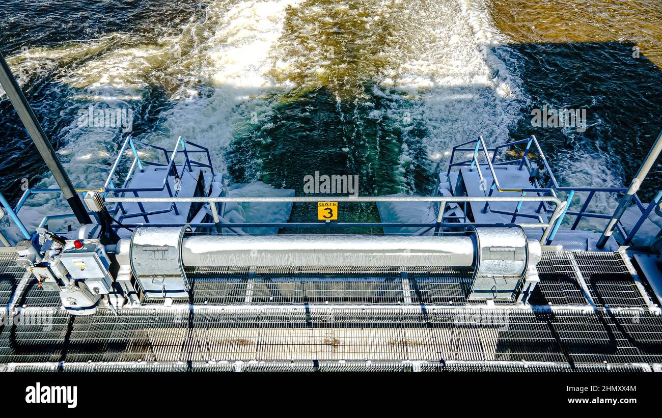 Heavy water is flowing out of the open dam Stock Photo - Alamy