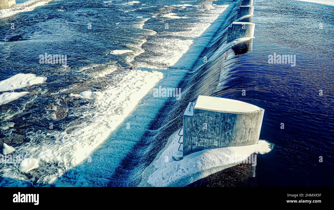 Ice has formed around the edges of the pillars in winter Stock Photo ...